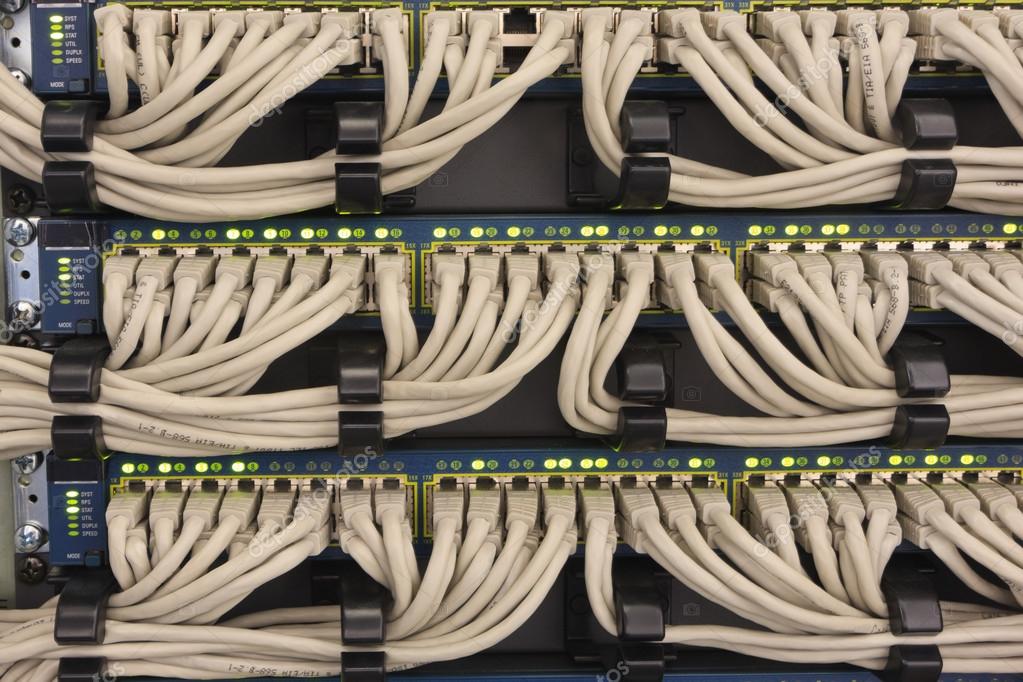 Network UTP cables connected to a router — Stock Photo © erikzunec ...