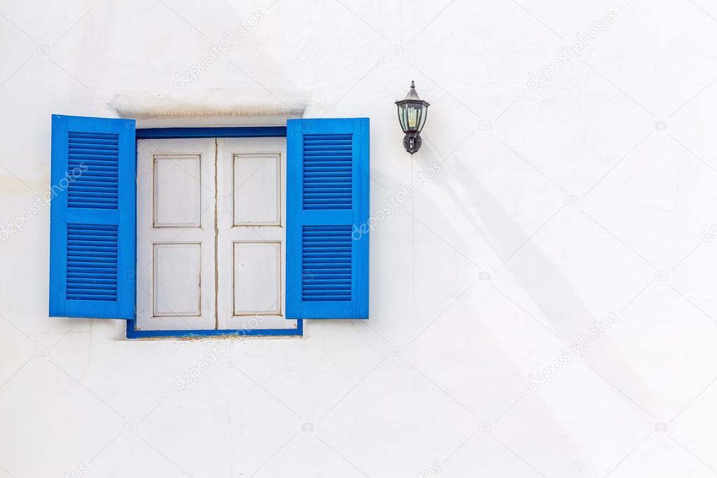 Vintage blue wood window on white wall — Stock Photo © platongkoh01 ...