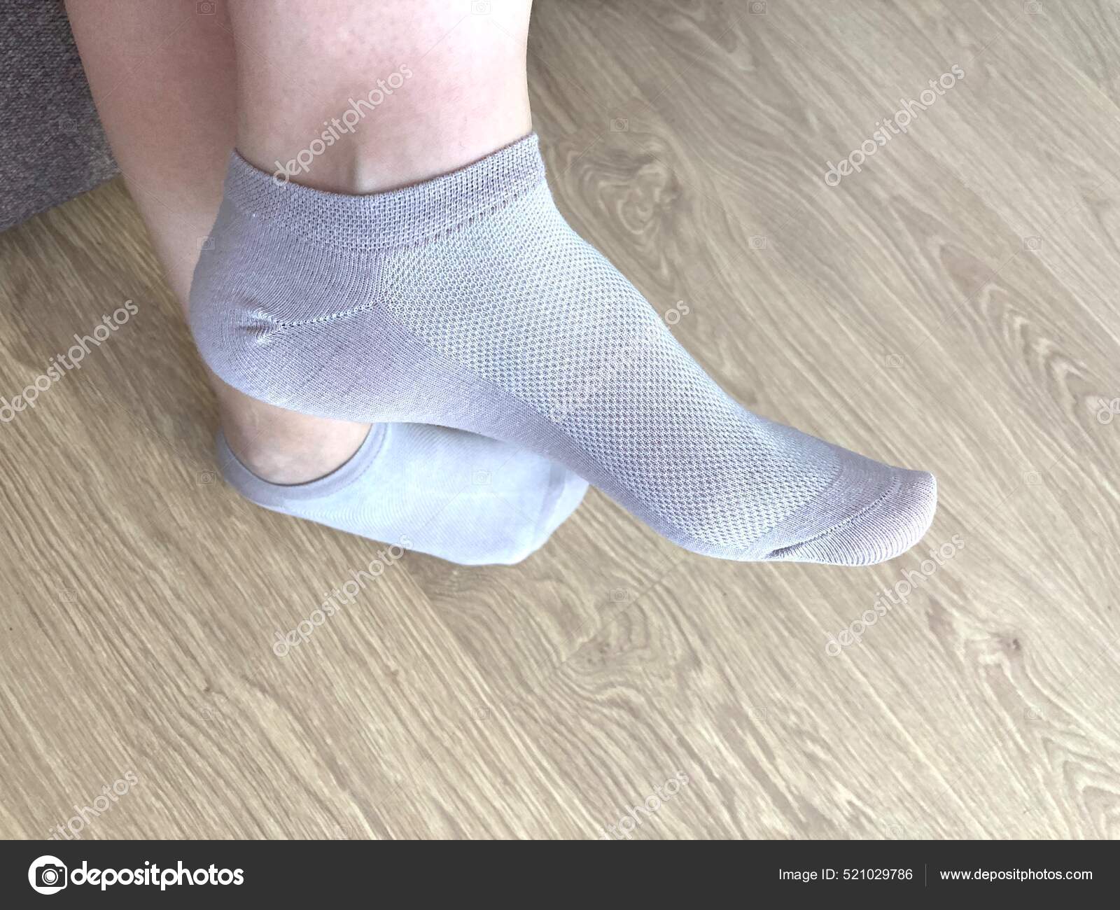 Women's Gray Socks Worn Leg — Stock Photo © VeraChan #521029786