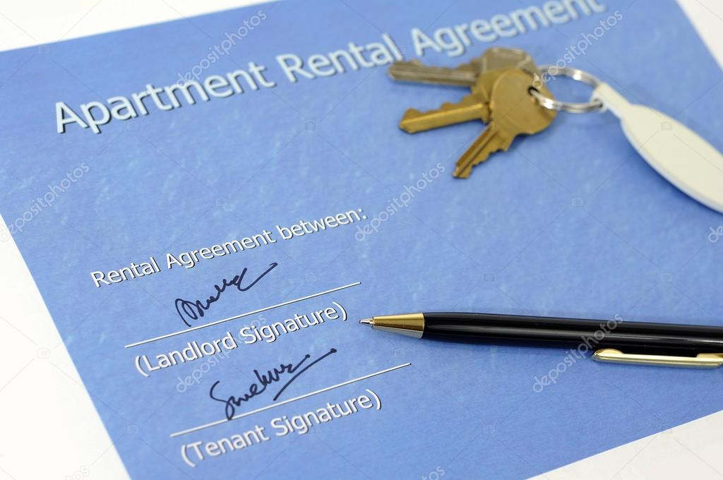 Signed rental agreement — Stock Photo © neelsky #37300041