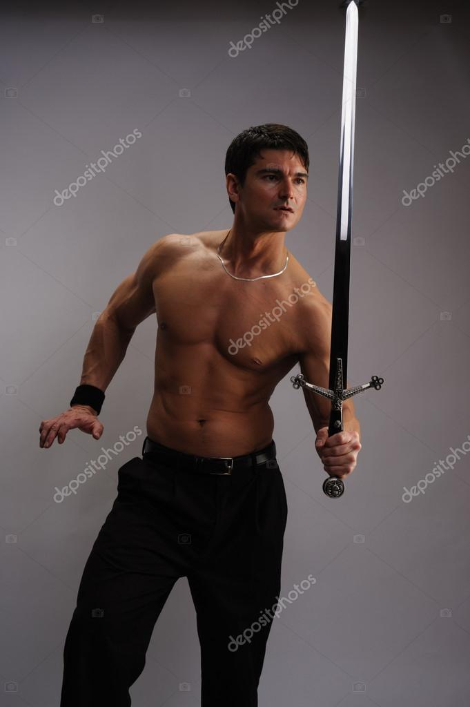 Man with sword Stock Photo by ©romancephotos 41336893