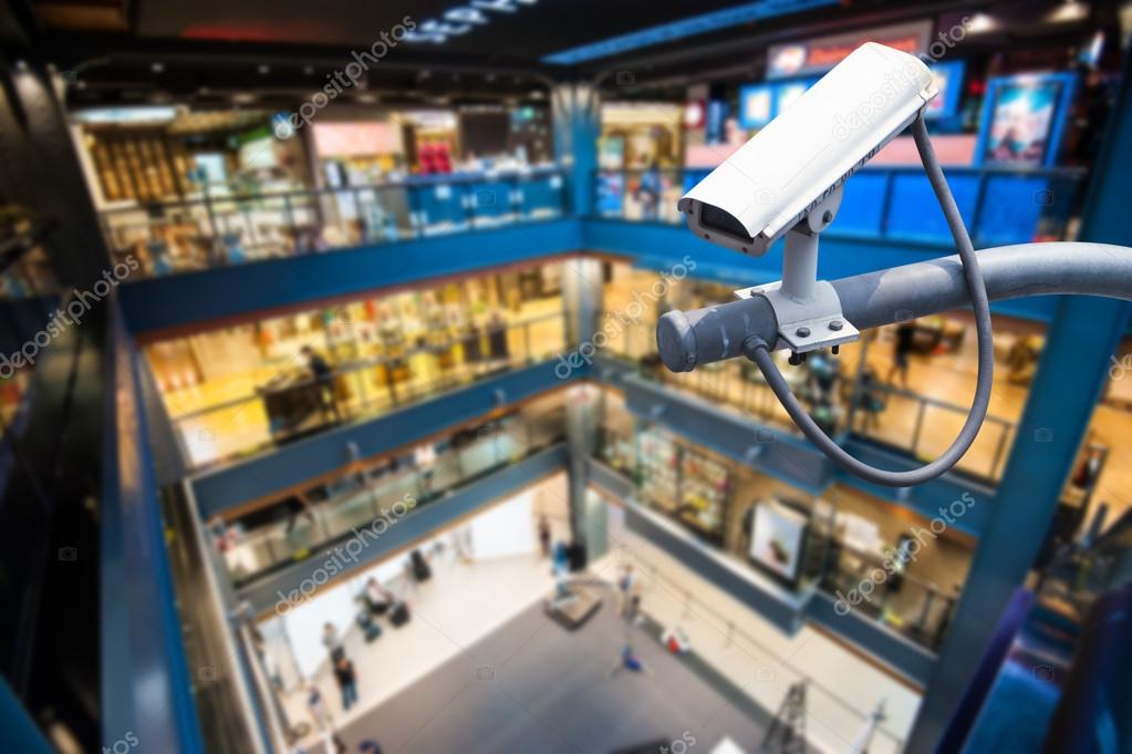 CCTV Camera Operating inside a station or department store Stock Photo ...