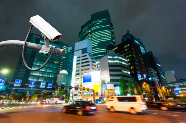 CCTV Camera or surveillance operating on street and building at - Stock ...