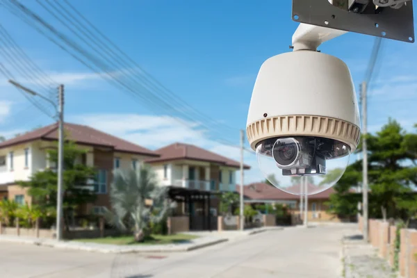 CCTV Camera with house in background Stock Photo by ©stnazkul 40546559