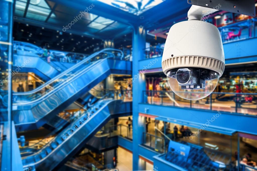 CCTV Camera Operating inside a station or department store Stock Photo ...