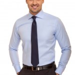 Well-dressed man in suit and tie. Charismatic businessman standing on ...