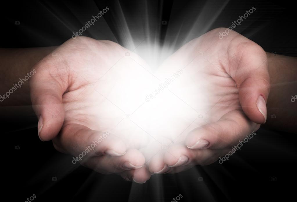 Holding hands open with glowing lights — Stock Photo © HorenkO #37503039
