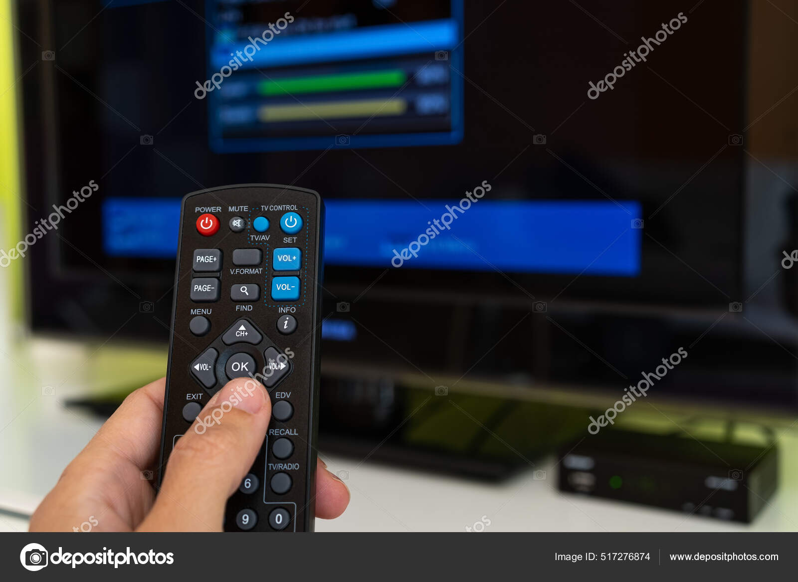Digital decoder with remote control and television monitor. Stock Photo ...