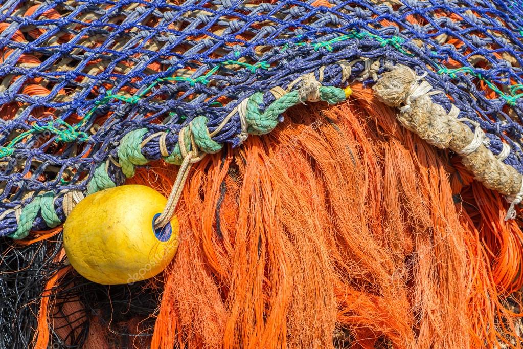 Colourful fishingnets aswaste from the see — Stock Photo © photoweges ...