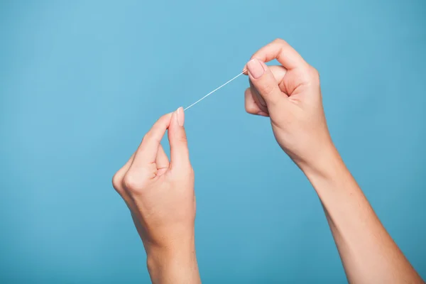 Teeth cleaning thread — Stock Photo © serdiukov #39380611