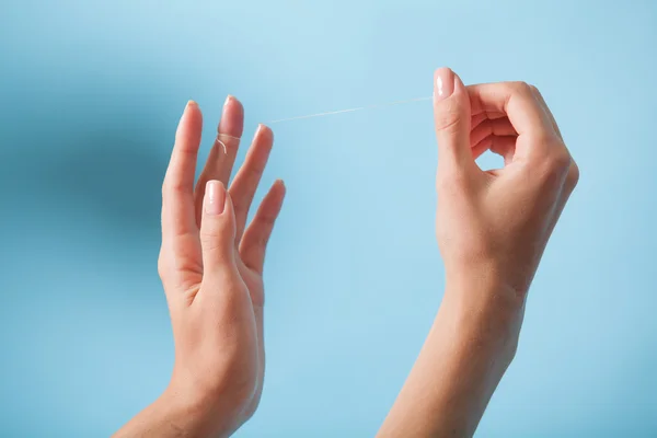 Teeth cleaning thread — Stock Photo © serdiukov #39380611