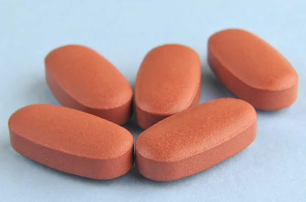 Brown tablets Stock Photo by ©avarand 38501321