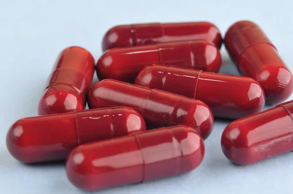 Red capsules Stock Photos, Royalty Free Red capsules Images | Depositphotos