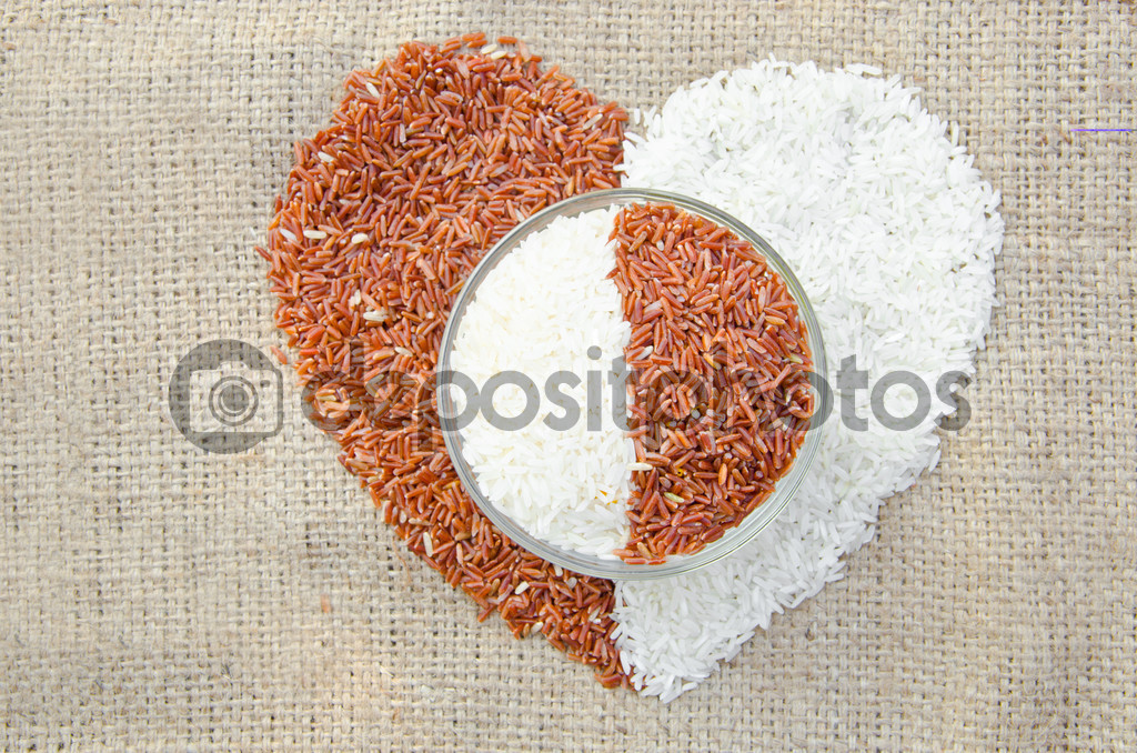 Raw Thai jasmine rice and raw brown rice heart shape Stock Photo by ...