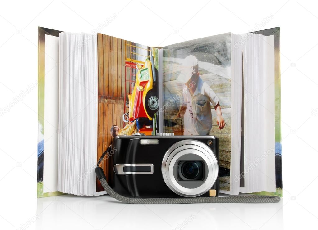 Camera and album — Stock Photo © idal #43985329