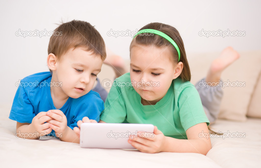 Children using tablet computer — Stock Photo © julaszka #39106355
