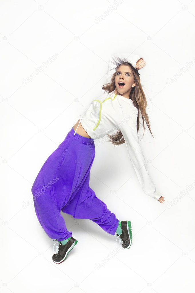 Beautiful young girl dancing — Stock Photo © abzalova #39025829