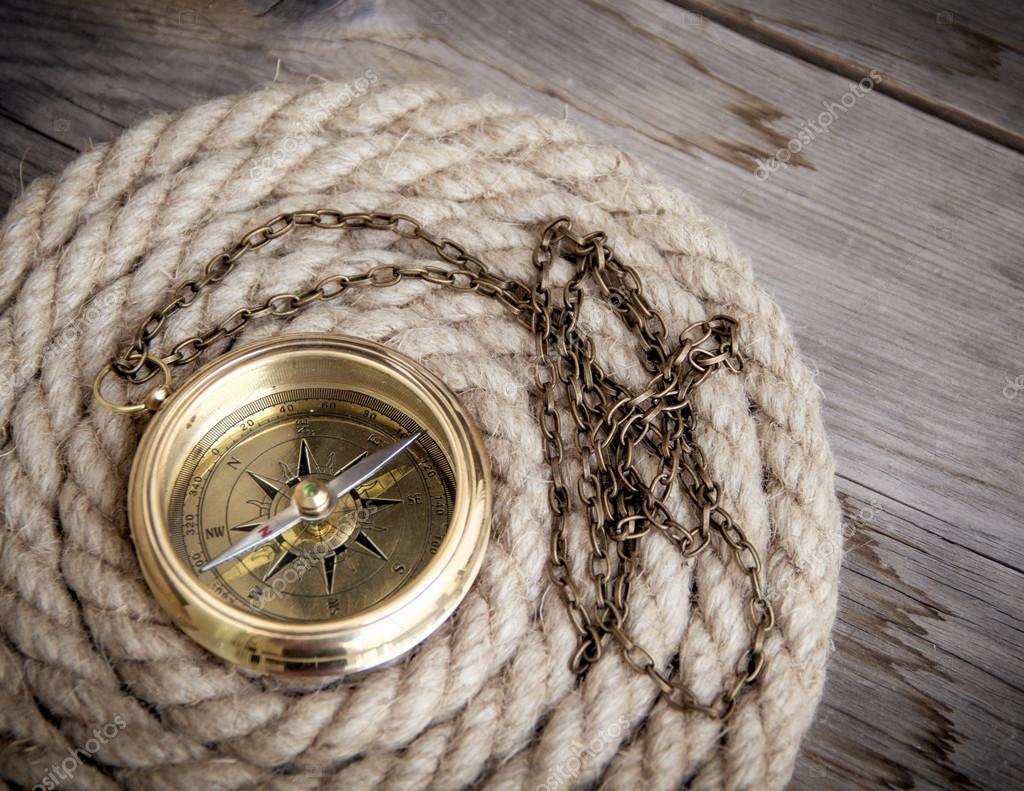 Antique compass and rope Stock Photo by ©karissaa 46221233