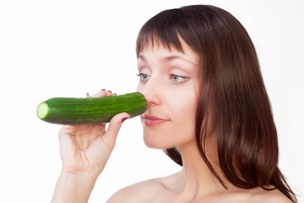 Girl eating cucumber Stock Photo by ©kopitin 45223955