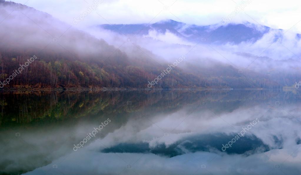 Lake and forest reflection scene in late Winter with fog. — Stock Photo ...