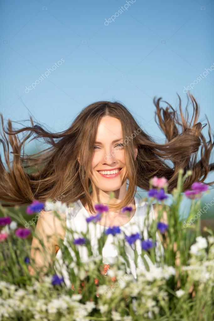 Pretty young girl with flying hair Stock Photo by ©PEPPERSMINT 46768231