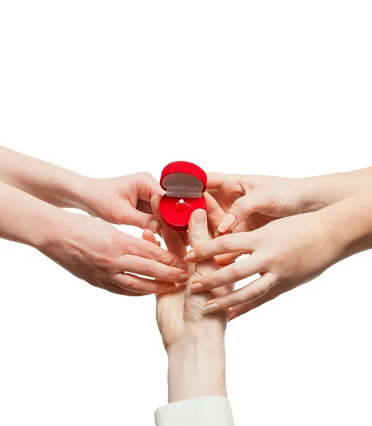 Two women hands fighting for ring being held by man Stock Photo by ©o ...