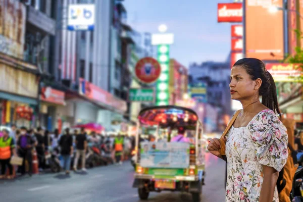 China town Bangkok Thailand, colorful streets of China Town Bangkok.Asian woman with bag ...
