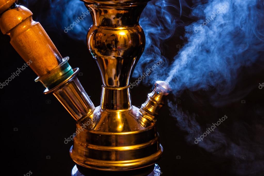 Water pipe with smoke Stock Photo by ©Jarrycz 40504315