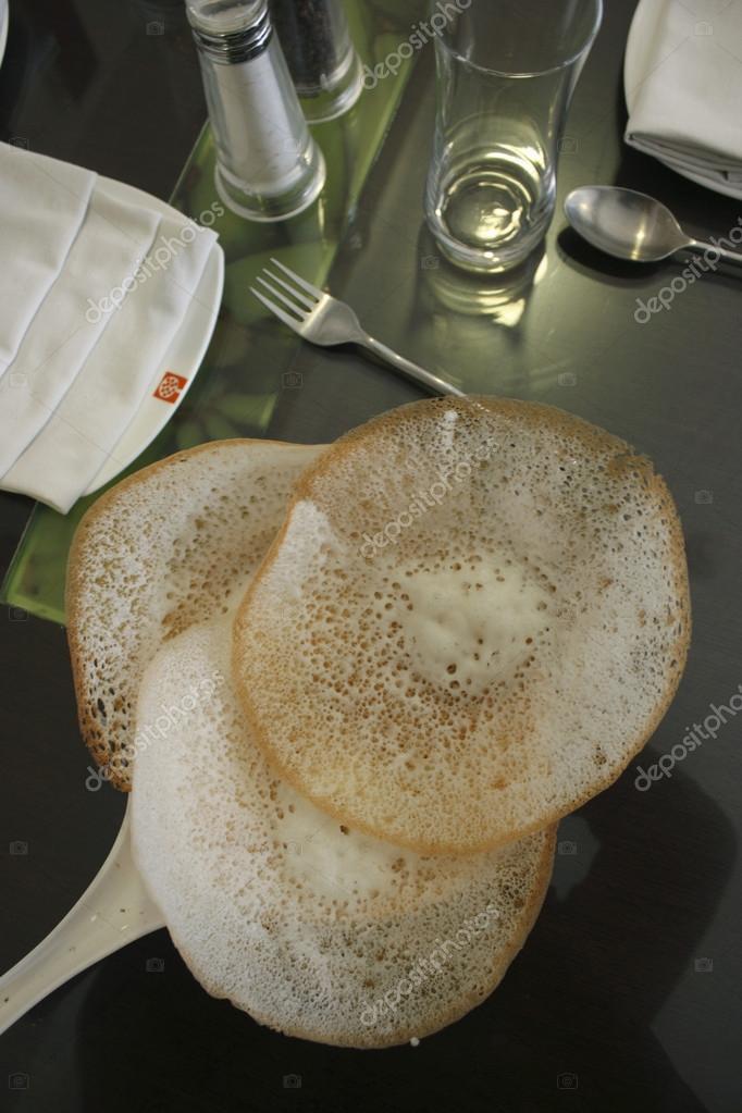 Appam - A pancake made of rice flour — Stock Photo © manubahuguna #50775407