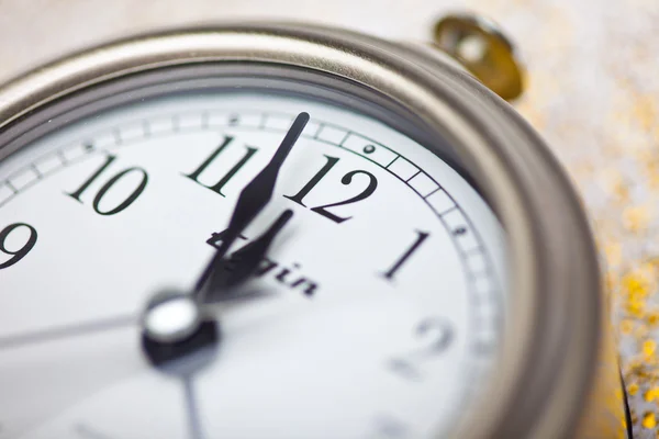 Clock Striking Twelve Stock Photo by ©derek@hatfielddesign.com 46477651