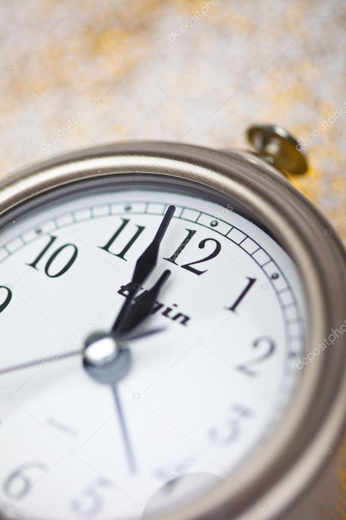 Clock Striking Twelve Stock Photo by ©derek@hatfielddesign.com 46477651