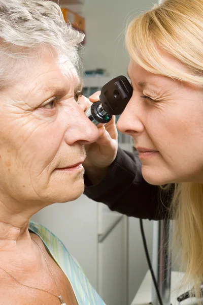 Lady having eye test examination - Stock Image - Everypixel