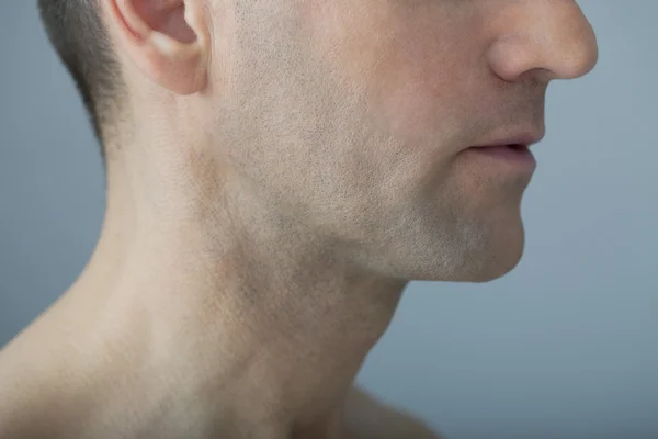 Man posing in studio — Stock Photo © londondeposit #33866107