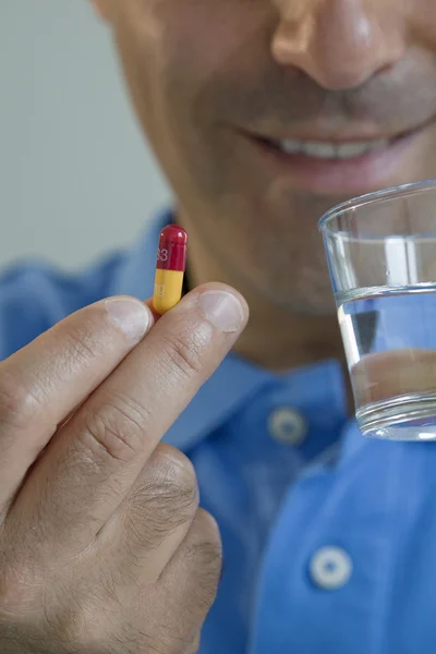 MAN TAKING MEDICATION - Stock Image - Everypixel