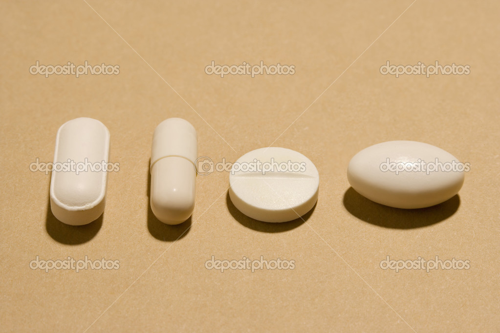 Pills on the table Stock Photo by ©imagepointfr 44392759