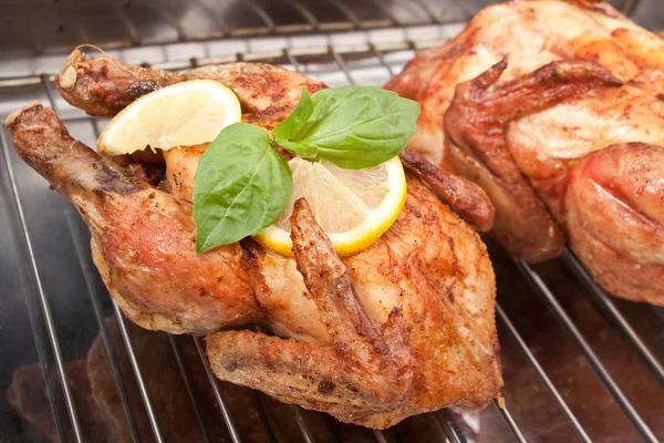 Two whole roasted chickens Stock Photo by ©Nalga 41984145