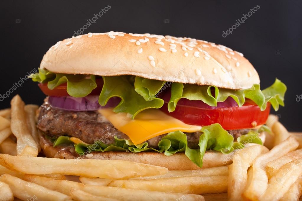 Big tasty cheeseburger Stock Photo by ©Nalga 41983759