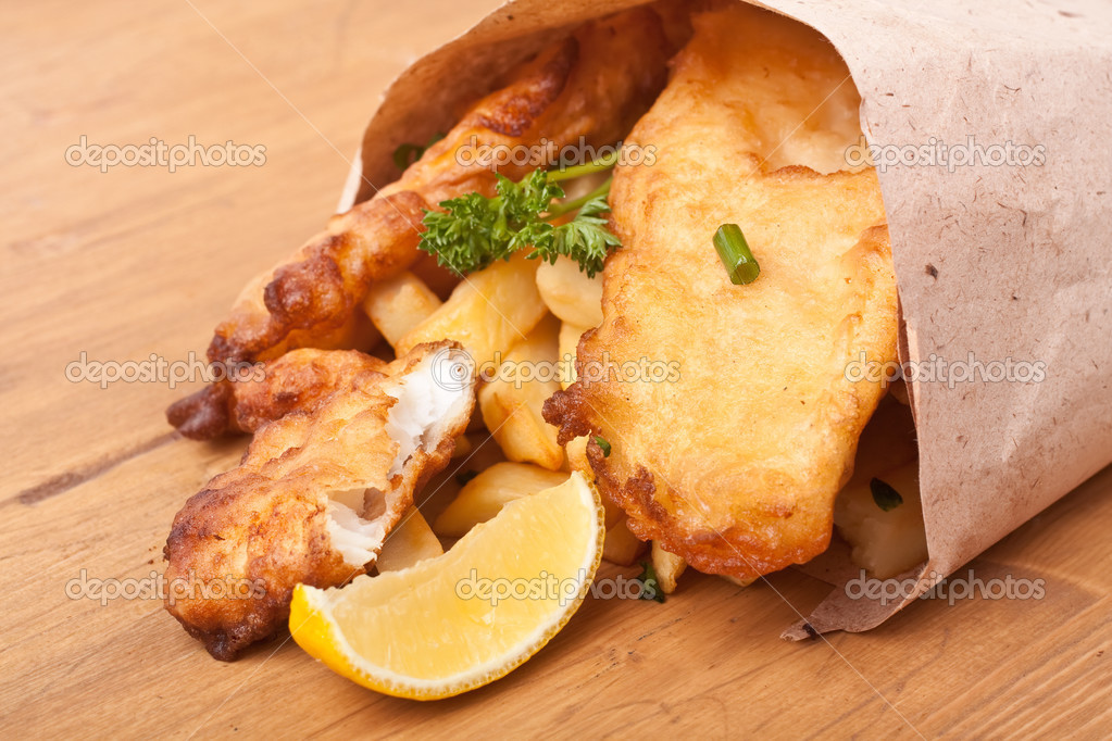 Fish and chips wraped in paper on a wooden table Stock Photo by ©Nalga ...