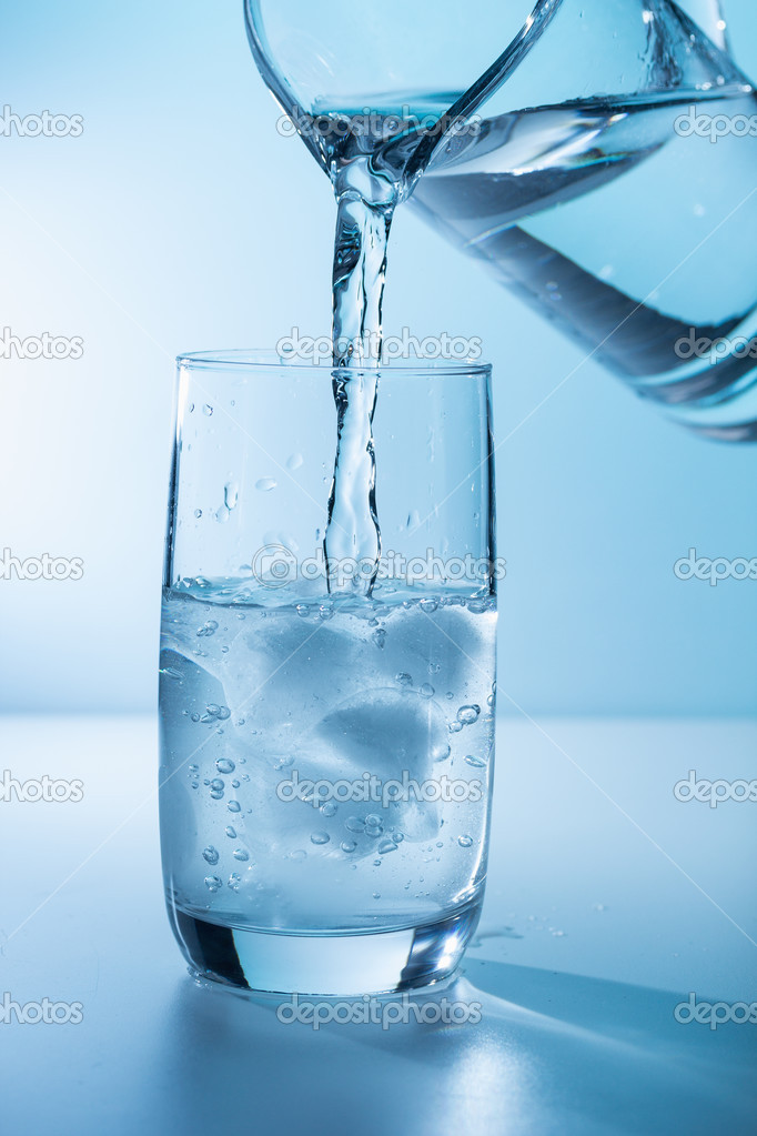 Pouring water — Stock Photo © Melica #44297609