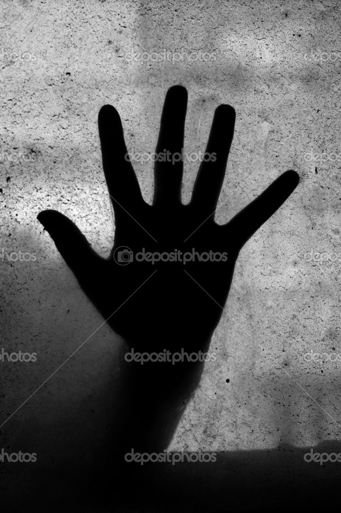 Mysterious hand on a window — Stock Photo © casarda #49849797