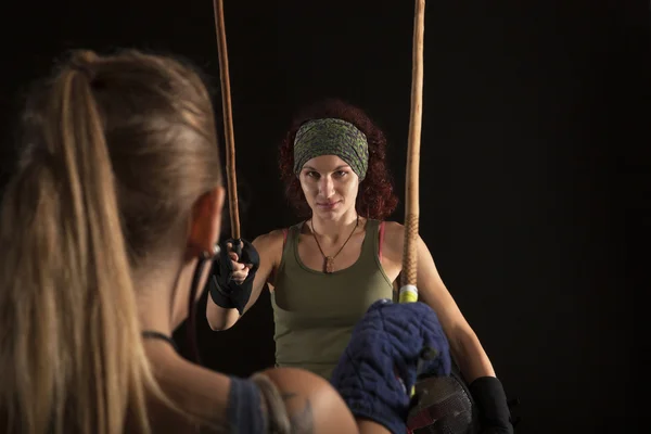 Women with sticks - Stock Image - Everypixel