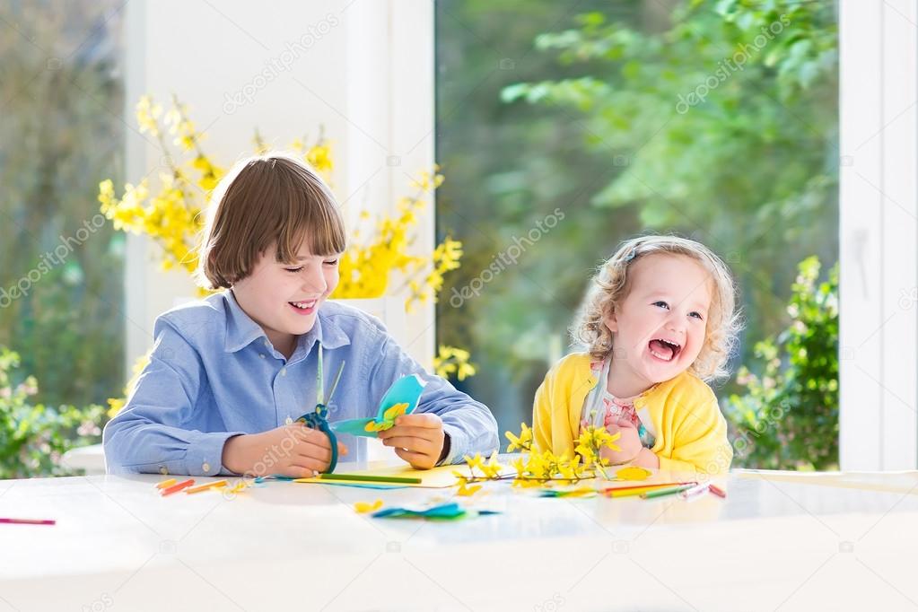 Two kids having fun together drawing — Stock Photo © FamVeldman #43243091