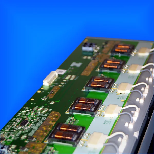 Electrical transformers aligned on PCB. — Stock Photo © GammaBurst ...