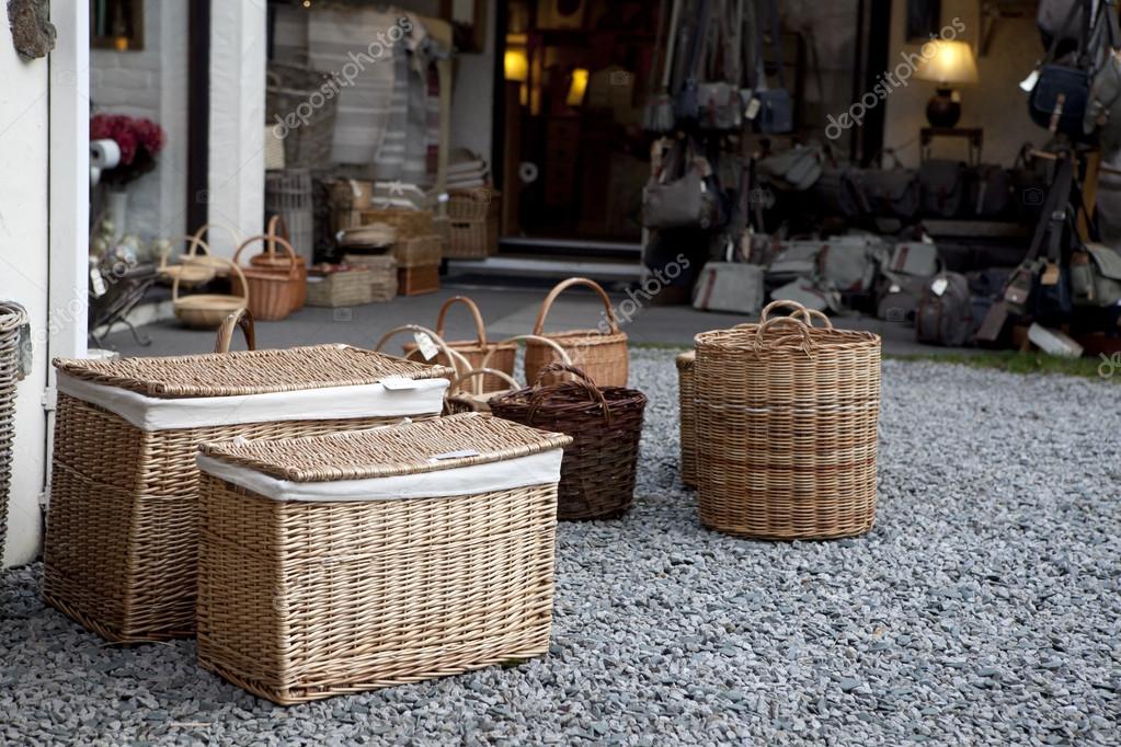Shop with woven basket Stock Photo by ©elenarostunova 45390075