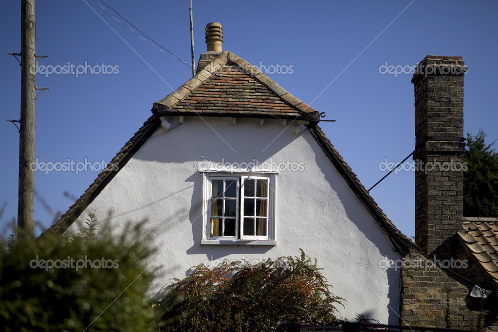Beautiful old thatched cottage Stock Photo by ©elenarostunova 46199559
