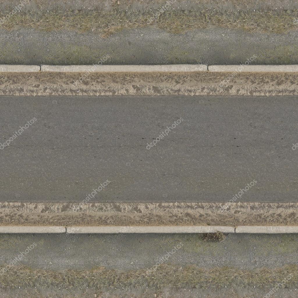 Texture of grey, asphalt road with clean surface and wet sand on edges ...