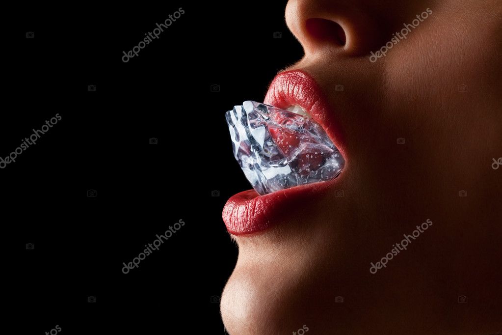 Ice cube in woman's mouth. — Stock Photo © fisher.photostudio #44834169
