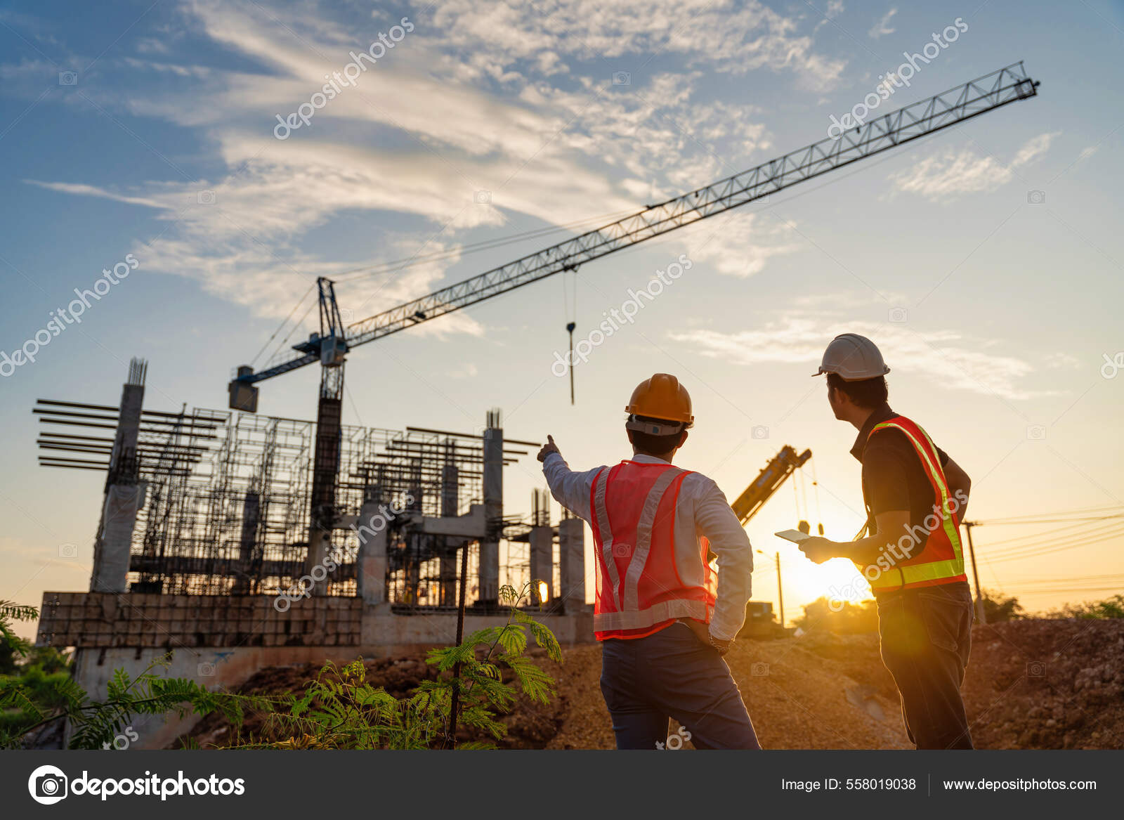 Asian Two Business Man Construction Engineers Supervising Progress ...