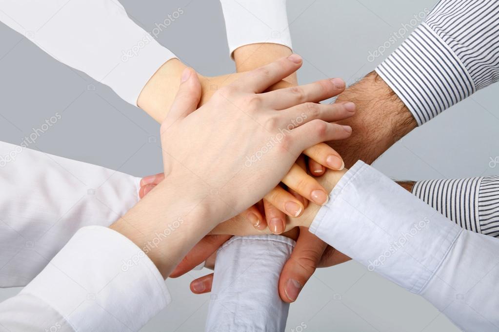 Hands on top of each other — Stock Photo © chagin #44686747