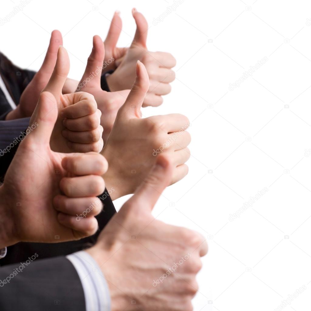 Hands showing thumbs up signs — Stock Photo © chagin #44751103